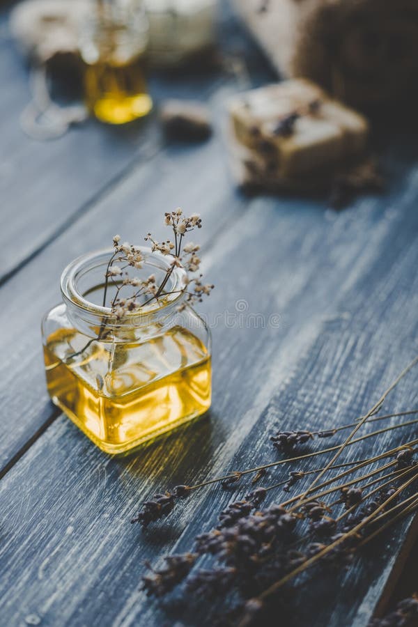 Spa Composition. Aroma Essential Oil on Rustic Wooden Background ...