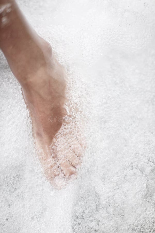 Spa - Female Leg Massage with Aerated Blue Water Stock Photo - Image of ...