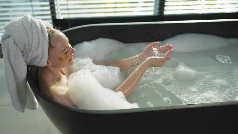 Spa Relaxation Young Woman Lying In Bath With Foam Bubbles Girl