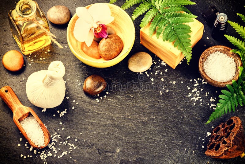 Spa Setting with Soap Bar, Herbal Massage Ball and Essential Oil Stock ...