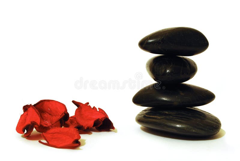 Spa stones and red petals stock photo. Image of healing - 12565932