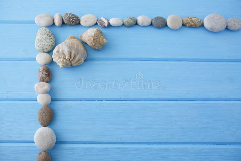 Spa Stones on Table Light Background and Large Sea Shell Stock Photo ...