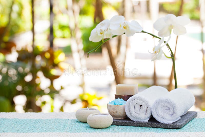 Spa And Wellness Massage Setting Still Life With Candle Towel And