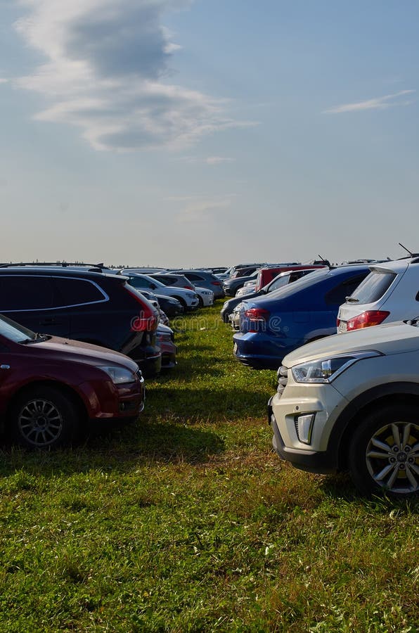 The Space between the Cars Parked on the Lawn. Stock Photo - Image of ...