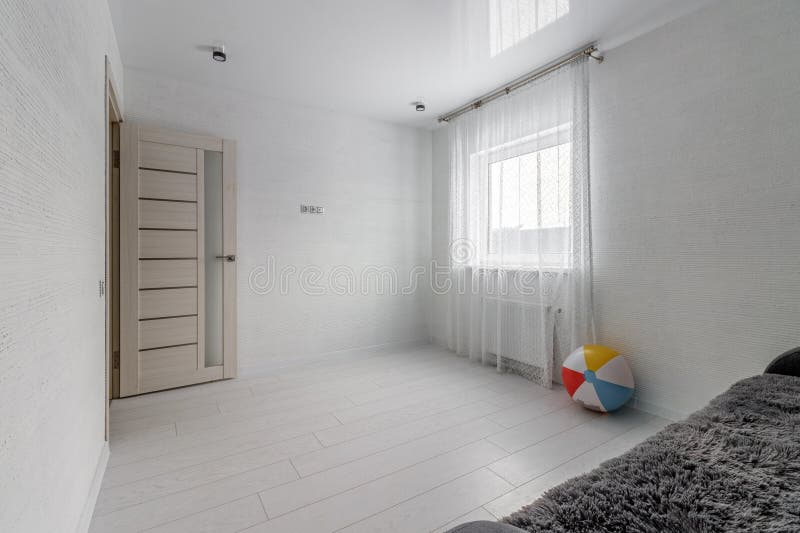 Space of Empty White Children S Room with Sofa and Colorful Inflatable ...