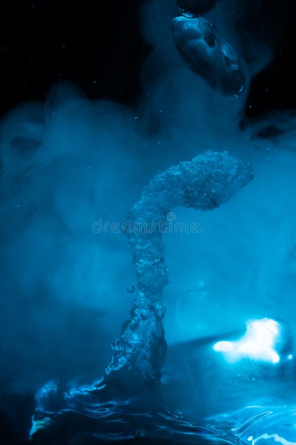 Space Geyser in Blue Fog and an Asteroid on a Black Starry Sky Stock ...