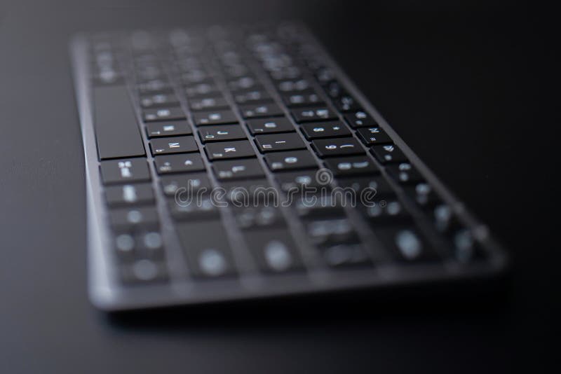 Space Gray Keyboard on a Black Background. Bluetooth Keyboard with ...