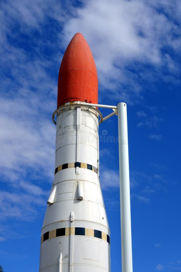 Space Rocket Against Blue Sky with Clouds Editorial Photography - Image ...