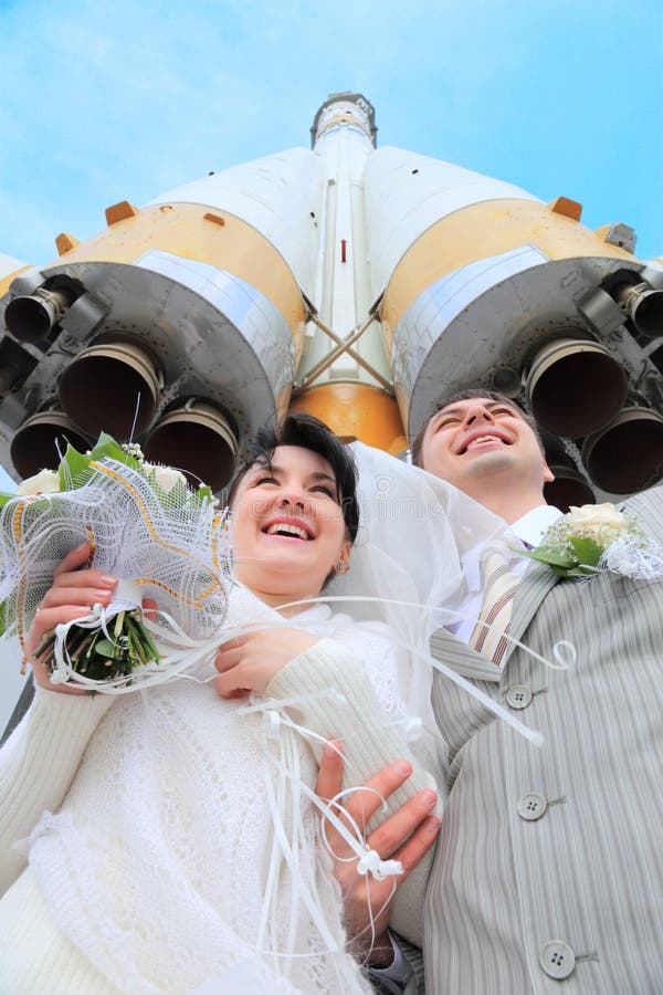 Space Rocket Over Fiance and Bride Stock Photo - Image of marriage ...