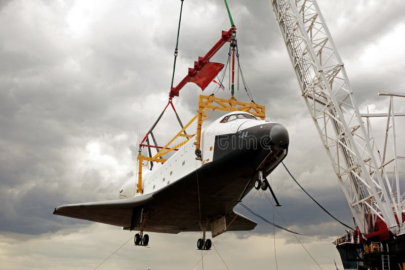 A Space Shuttle on the Crane Getting Retired Stock Photo - Image of ...