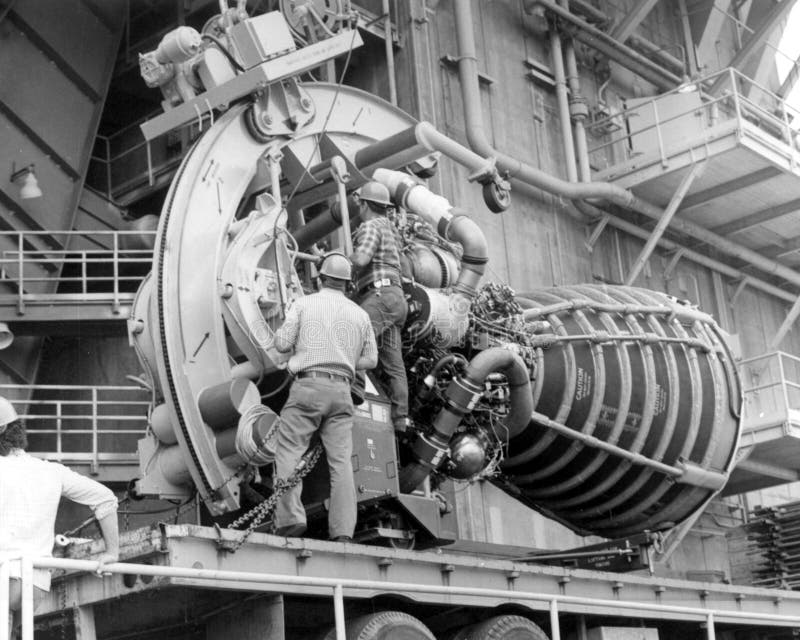 Space Shuttle Main Engine Hoisted Into Test Stand Picture. Image: 218693626