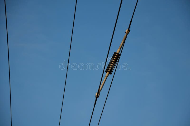A Spacer Used To Separate High Voltage Wires, Held by a Common Stock ...