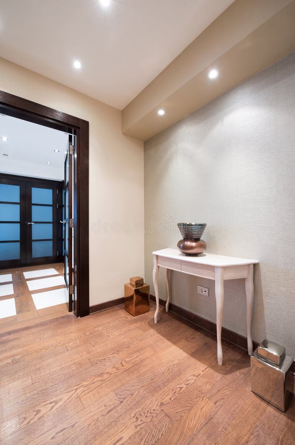 Spacious Anteroom Interior with Large Mirror and Shiny Brown Par Stock ...