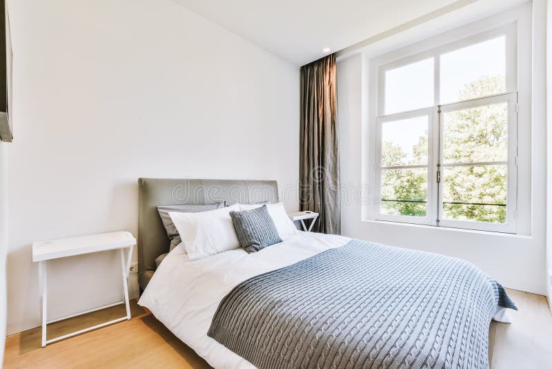 Spacious Bedroom in Modern Flat Stock Image - Image of daytime ...