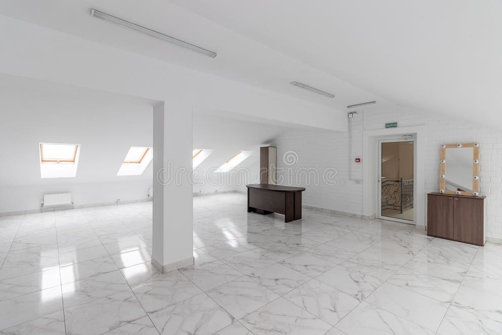 Spacious Empty Hollow Attic with a Tiled Floor and a Large Mirror Stock ...