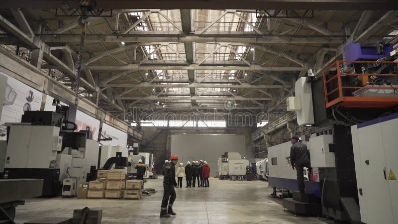 Large Industrial Workshop with Workers and Machinery Stock Footage ...