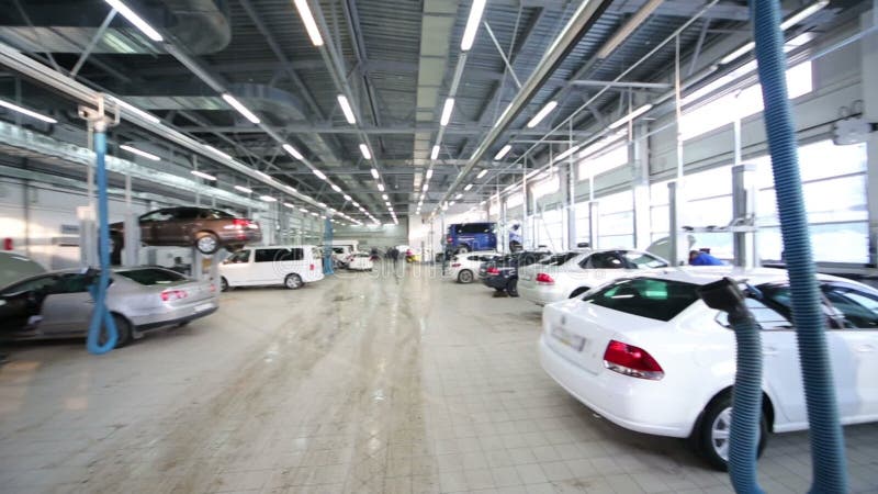 Spacious Hall with Modern Equipment and Cars in Stock Footage - Video ...