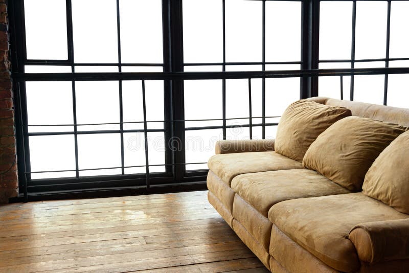 Spacious Industrial Loft Room with Big Windows and Brown Sofa Stock ...