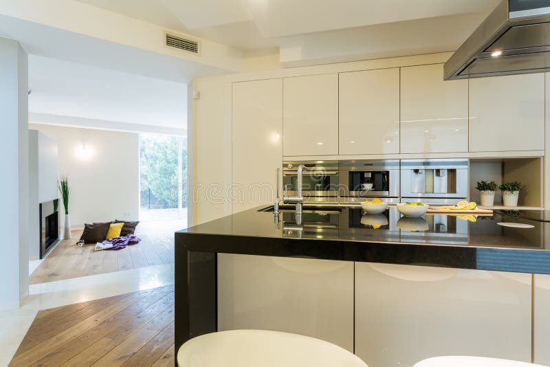 Spacious Kitchen In Modern Apartment Stock Photo - Image of bright ...