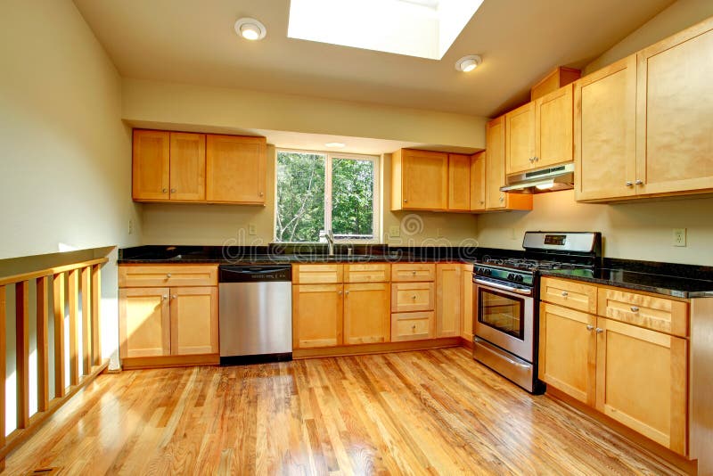 Beautiful Kitchen with Wood Floors Stock Photo - Image of decorator ...