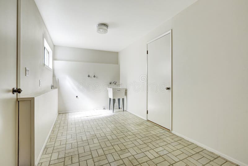 Spacious Laundry Room in Empty House Stock Photo - Image of remodeled ...