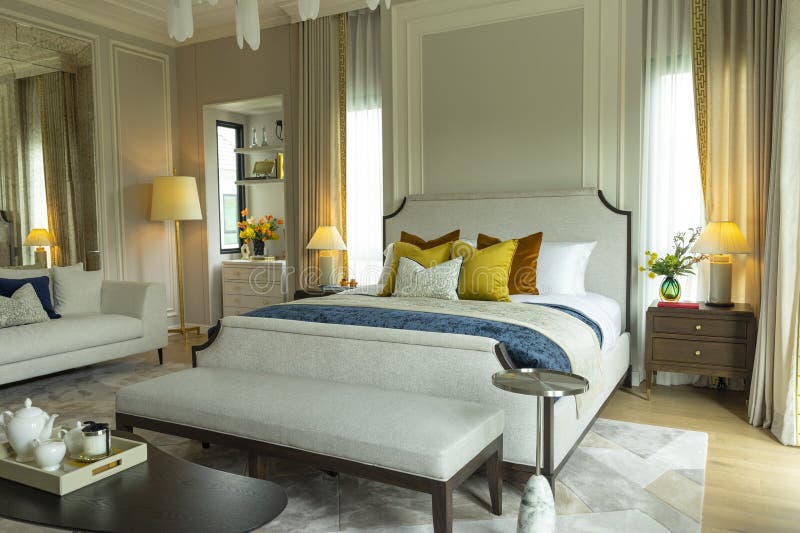 Master Bedroom with Large Area Rug, Wood Floor, White Ceiling Lamp and ...