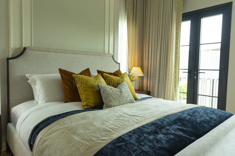 Master Bedroom with Large Area Rug, Wood Floor, White Ceiling Lamp and ...