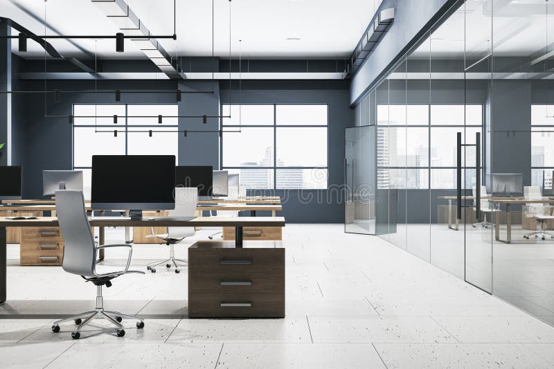 A Spacious, Modern Office Interior with Desks, Computers, and Chairs on ...