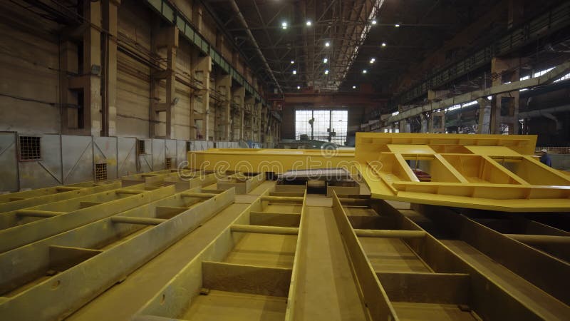 Inside a Detailed Shipbuilding Facility Featuring Various Assembled ...