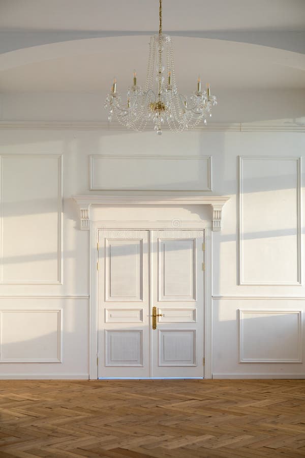 Spacious White Classic Room with Closed Doors Stock Photo - Image of ...