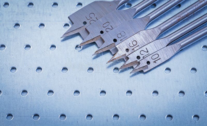 Spade Bits for Drilling Wood on Perforated Metal Stock Image - Image of ...