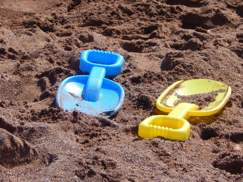 Spades on sandy beach stock photo. Image of greatbritain - 126707888