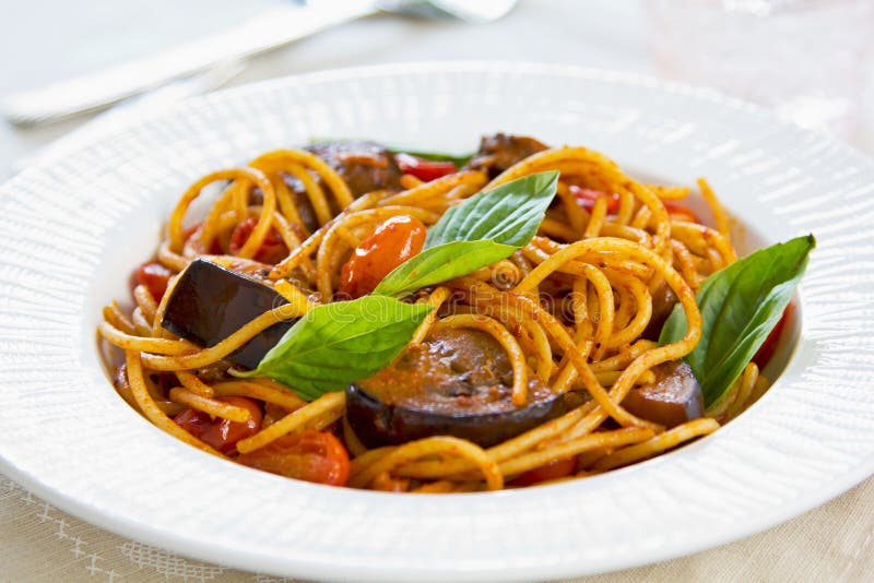Spaghetti alla Norma stock image. Image of italian, green - 28464089