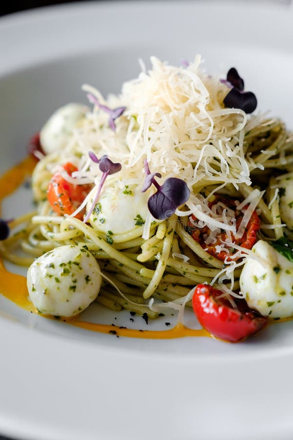 Spaghetti with Basil and Mozzarella Cheese Stock Image - Image of ...