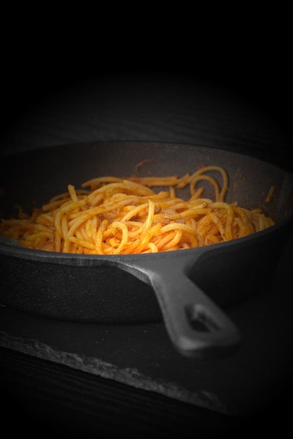 Spaghetti Bolognese Cooked in a Cast Iron Frying Pan. Stock Photo ...