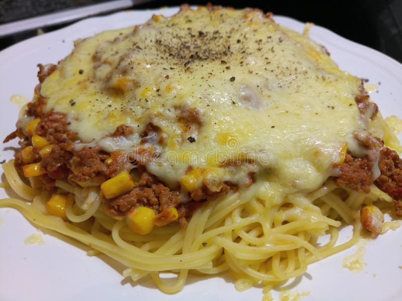 Spaghetti Bolognese Covered in Melted Cheese Stock Photo - Image of ...