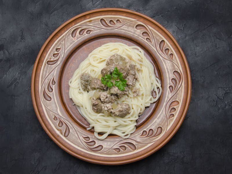 Spaghetti with Braised Beef Liver Top View - Selective Stock Photo ...