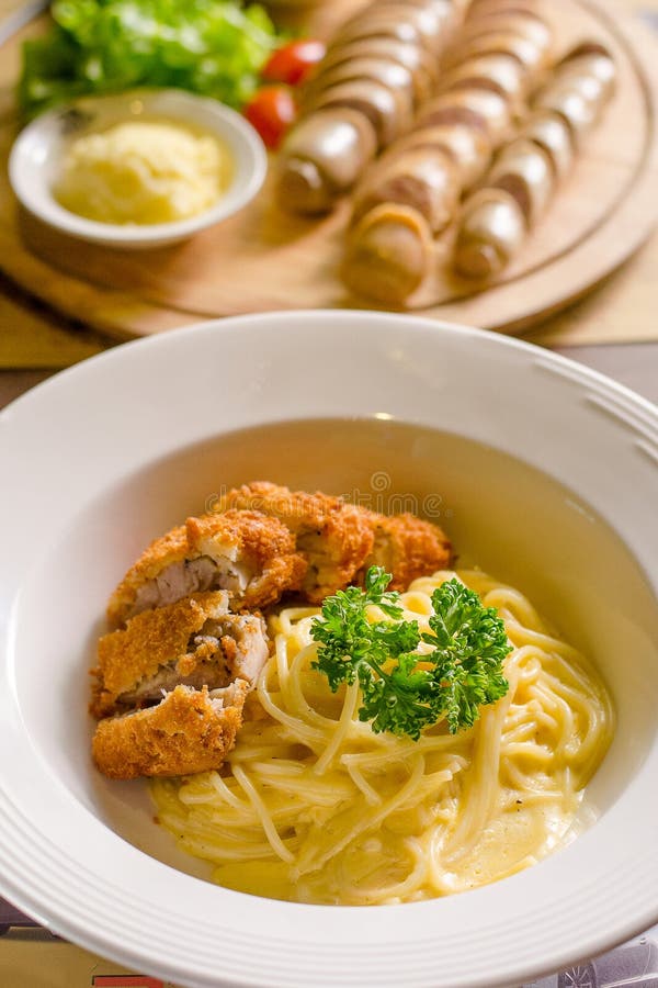 Spaghetti Carbonara with Deep Fried Pork Stock Photo - Image of ...