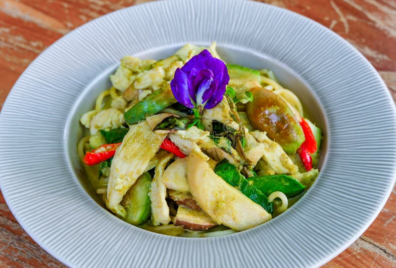Spaghetti Chicken with Green Curry Sauce Stock Photo - Image of ...