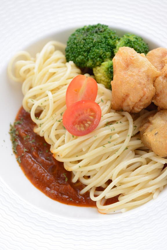 Spaghetti with Chicken Nuggets Stock Image - Image of gastronomy ...
