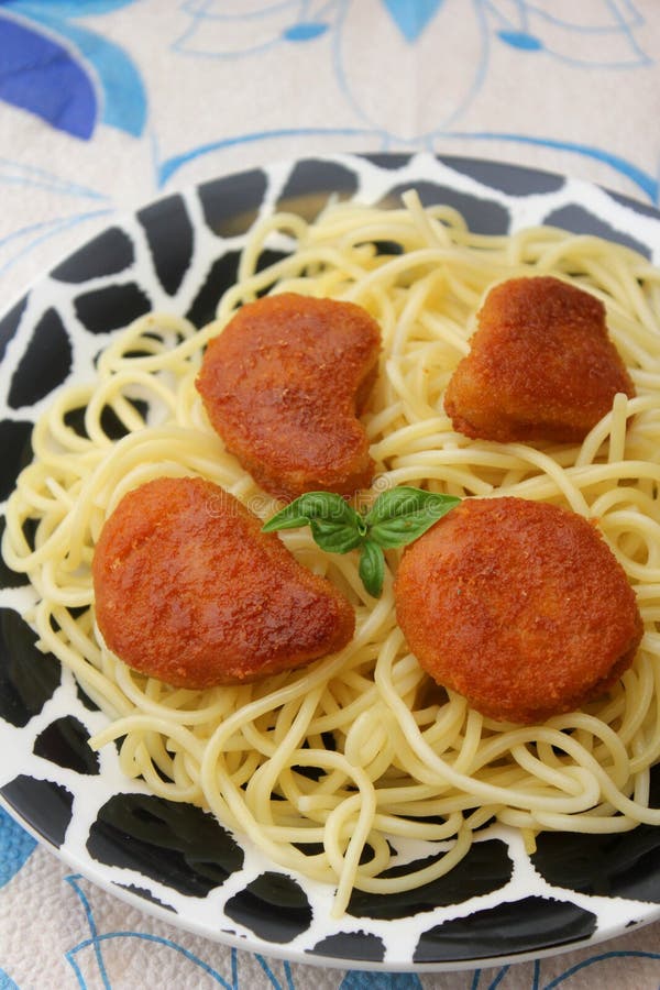 Spaghetti with Chicken Nuggets Stock Photo - Image of noodles ...
