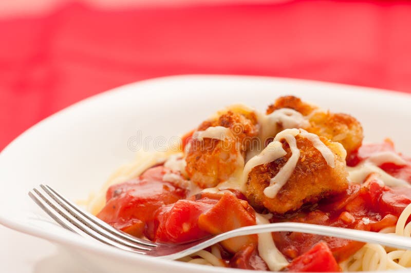 Spaghetti with Chicken Nuggets Stock Photo - Image of sesame, cucumber ...