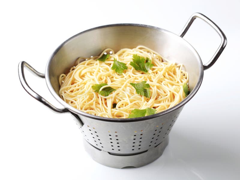 Spaghetti in a colander stock image. Image of metal, boiled - 18385121
