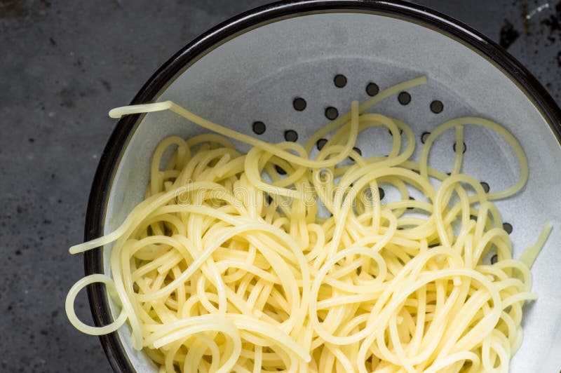 Spaghetti Cooked and Put in an Enamel Colander Stock Photo - Image of ...