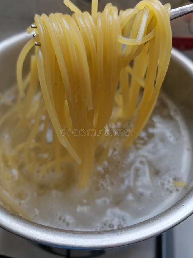 Spaghetti Cooking Drained Al Dente Stock Photo - Image of pasta, dairy ...