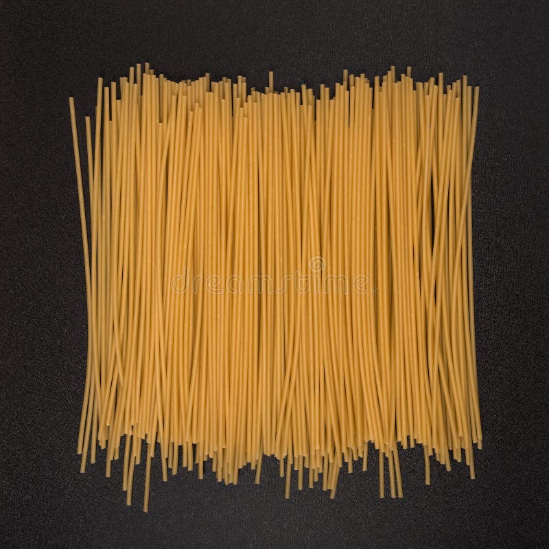 Spaghetti from Durum Wheat on Black Background. Italian Raw Pasta Stock ...