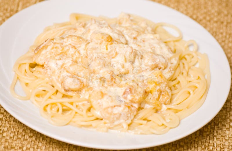 Spaghetti with Fish and Cream Sauce Stock Image - Image of closeup ...