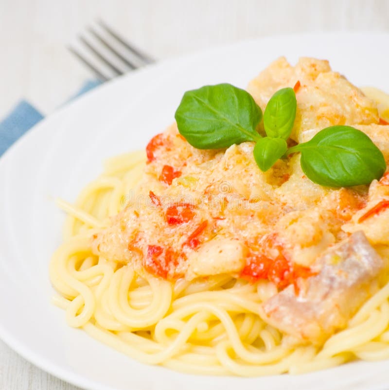 Spaghetti with Fish, Vegetables and Cream Sauce Stock Image - Image of ...