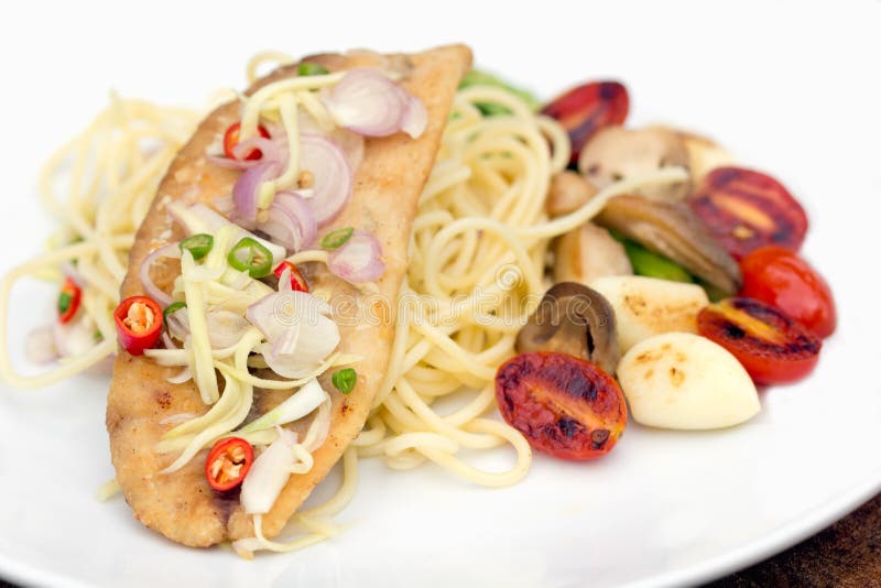 Spaghetti with Fried Fish, Garlic and Chili in Thai Cuisine, Sid Stock ...