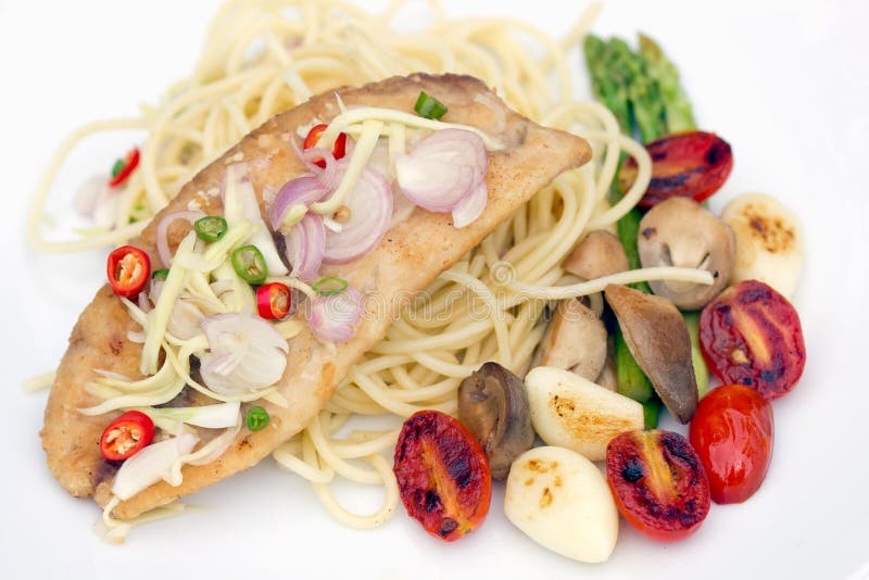 Spaghetti with Fried Fish, Garlic and Chili in Thai Cuisine, on Stock ...